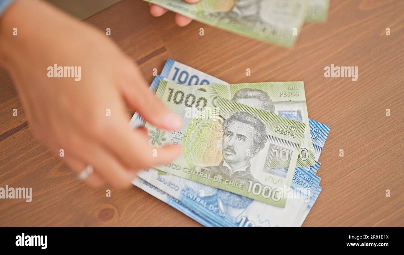 Young woman counting banknotes wooden hi-res stock photography and ...