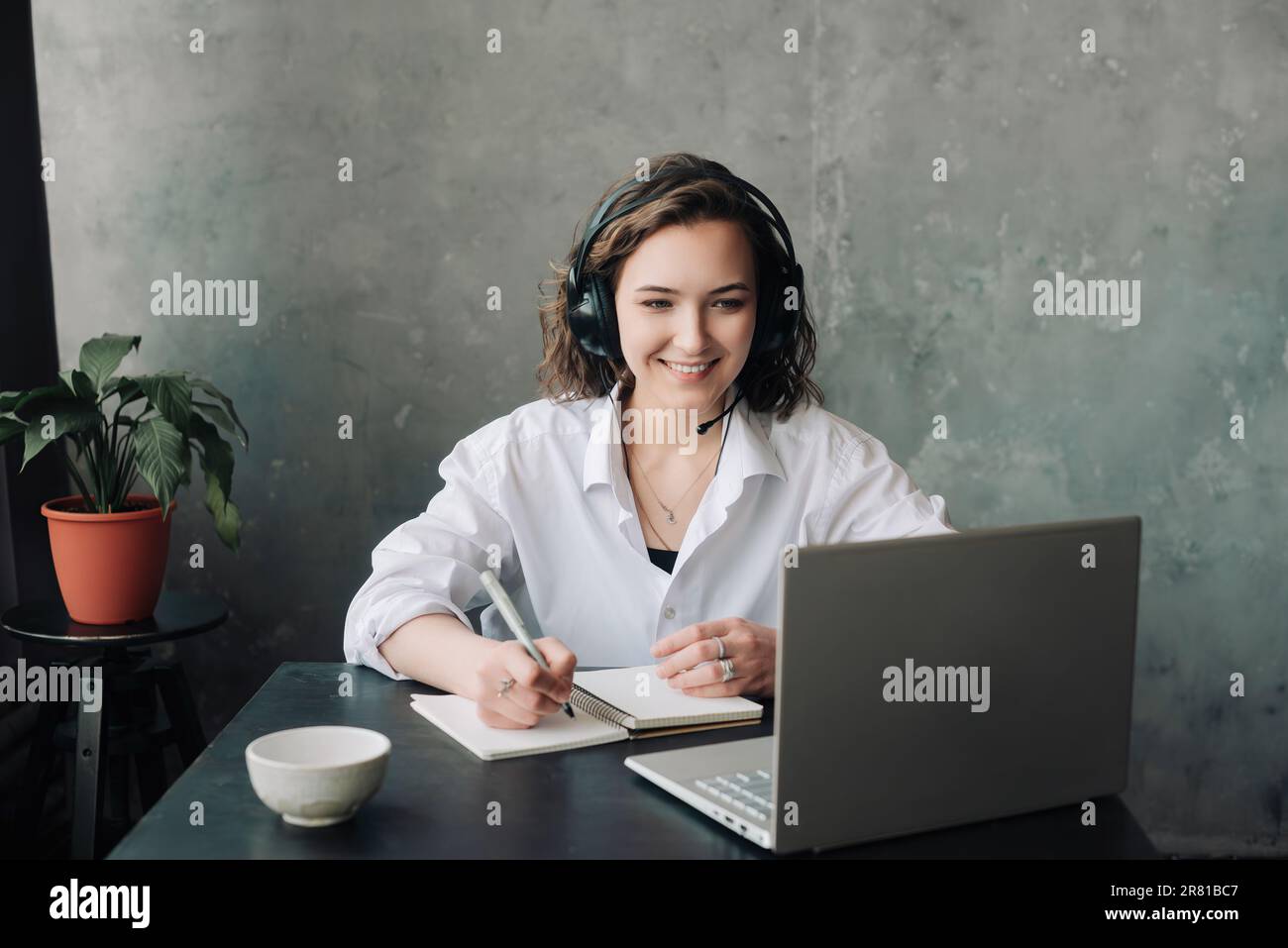 Empowering Distance Learning: Woman Engaged in E-Learning with Laptop ...
