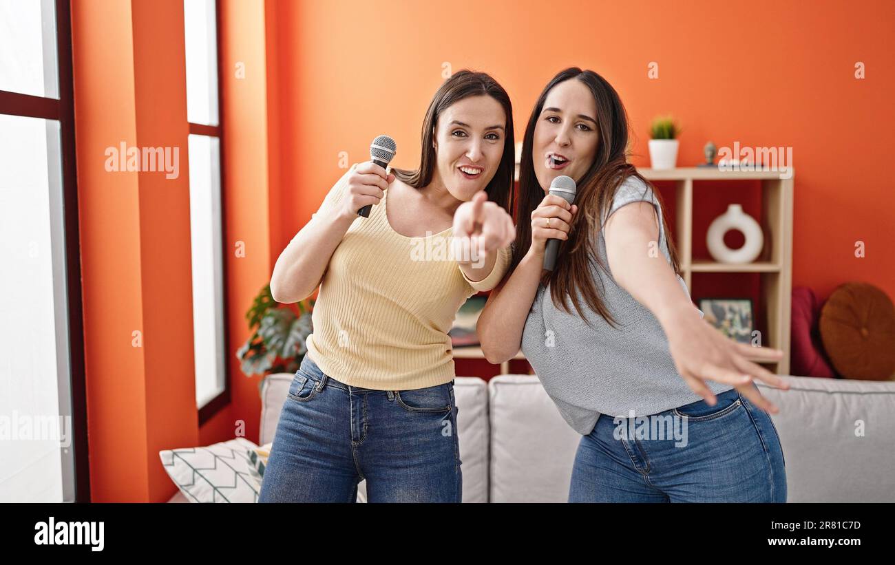 Attractive woman dancing singing hi-res stock photography and images ...