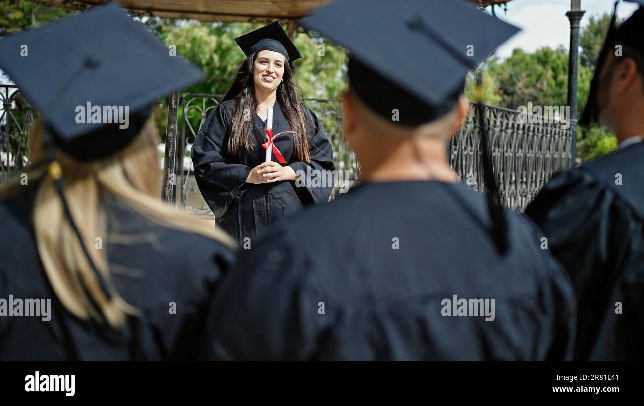 Group of people students graduated telling speech at university campus ...