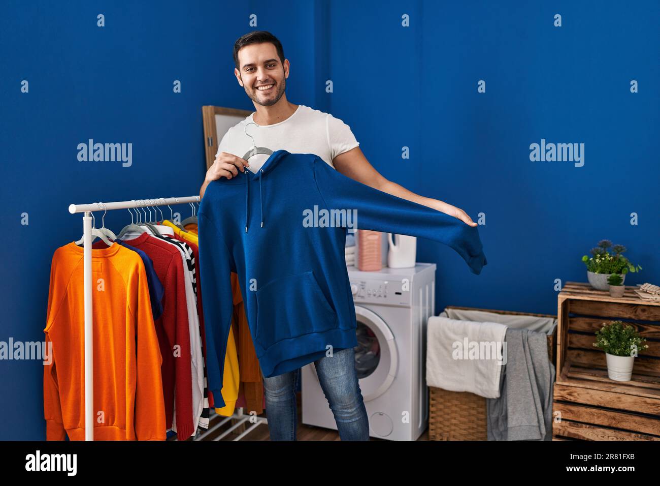 Man putting detergent on clothes hi-res stock photography and images ...