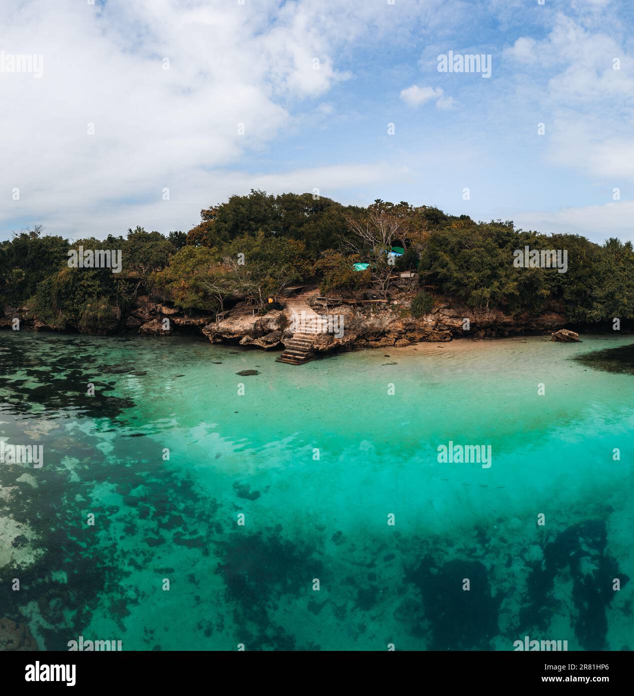 Waikuri Sumba lagoon in Indonesia, surrounded with rock cliff and ...