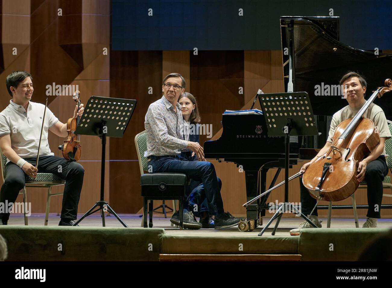 Artists of the Kazakh Forte Trio perform in front of the audience of ...