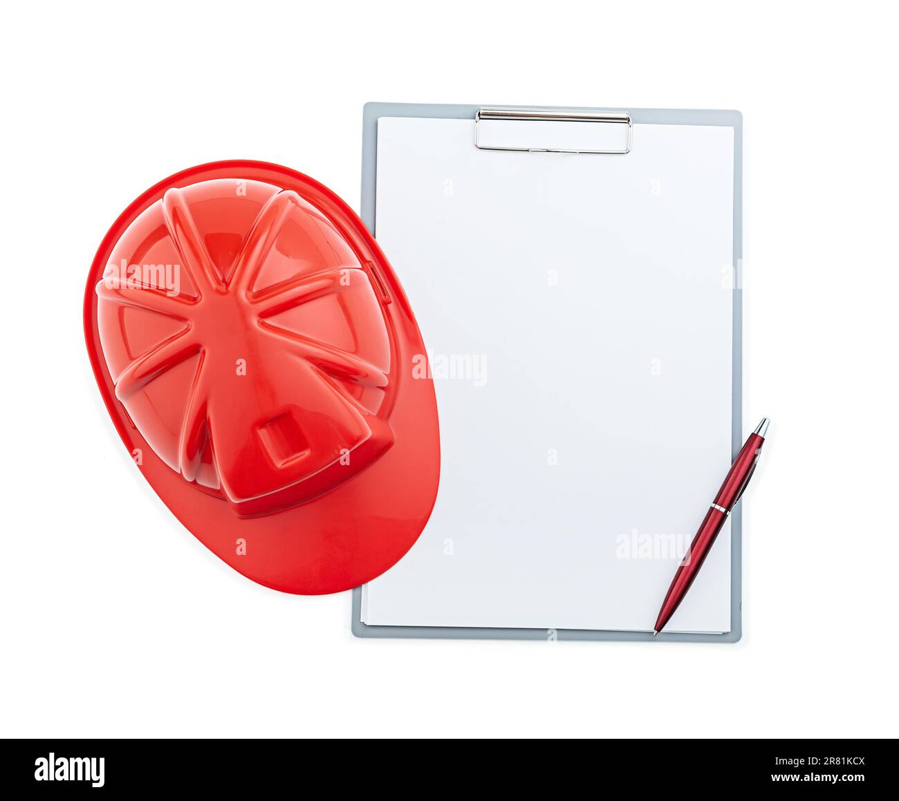 Red Construction Helmet And Ballpoint Pen On Clipboard Isolated Stock ...