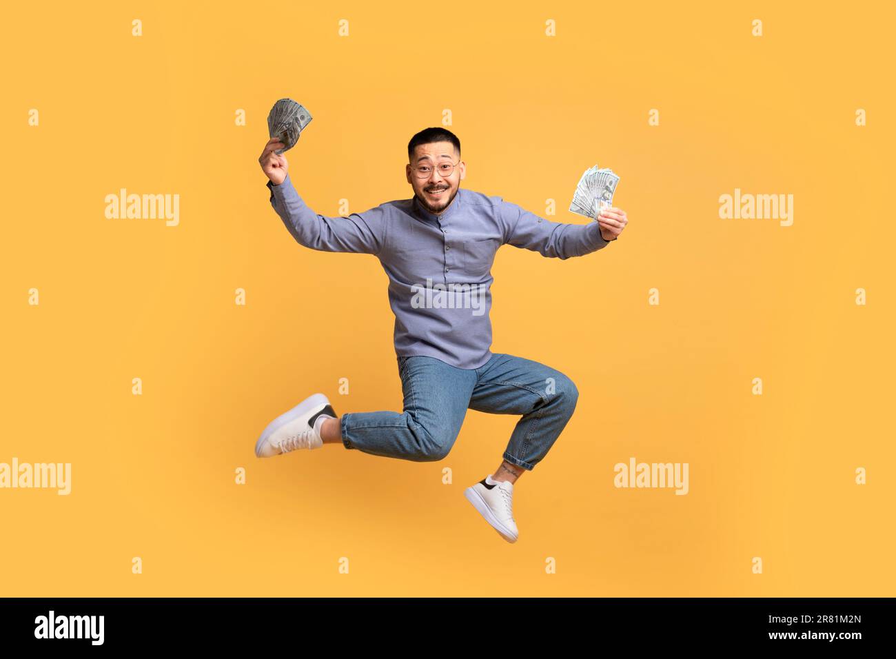 Cash in air hi-res stock photography and images - Alamy