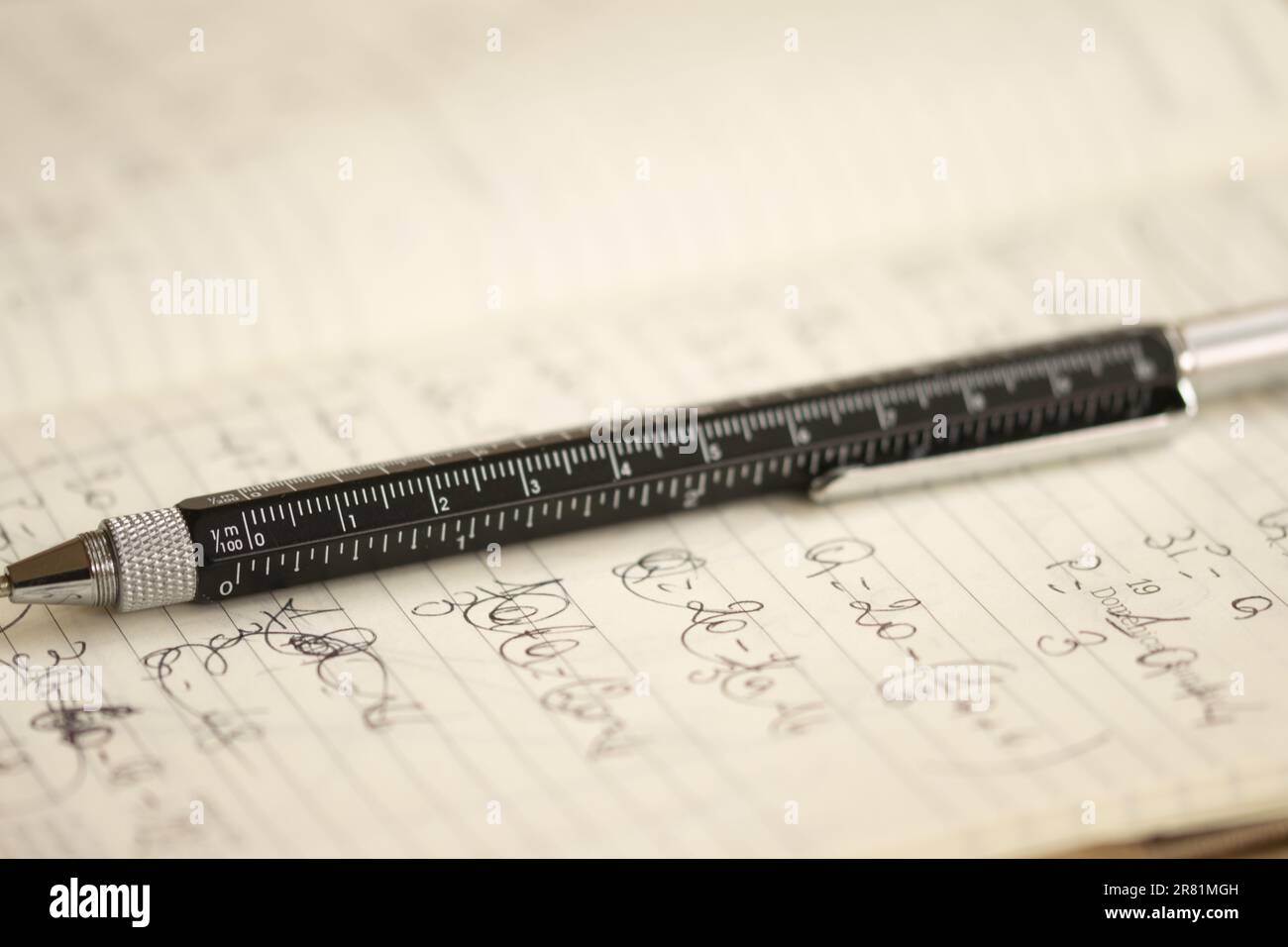 concept of calculation and measures with a pen equipped with units of ...