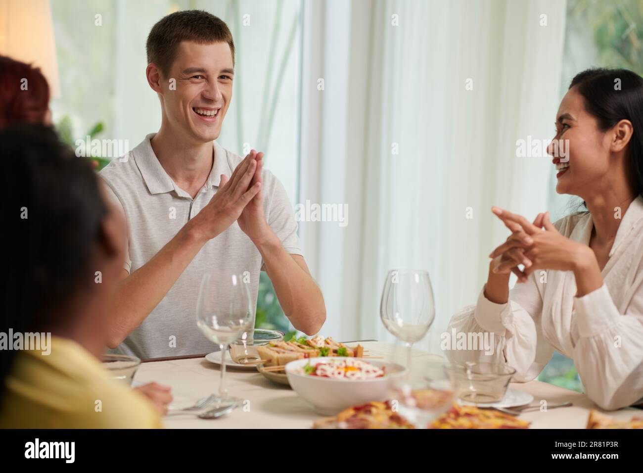 Laughing at jokes hi-res stock photography and images - Alamy