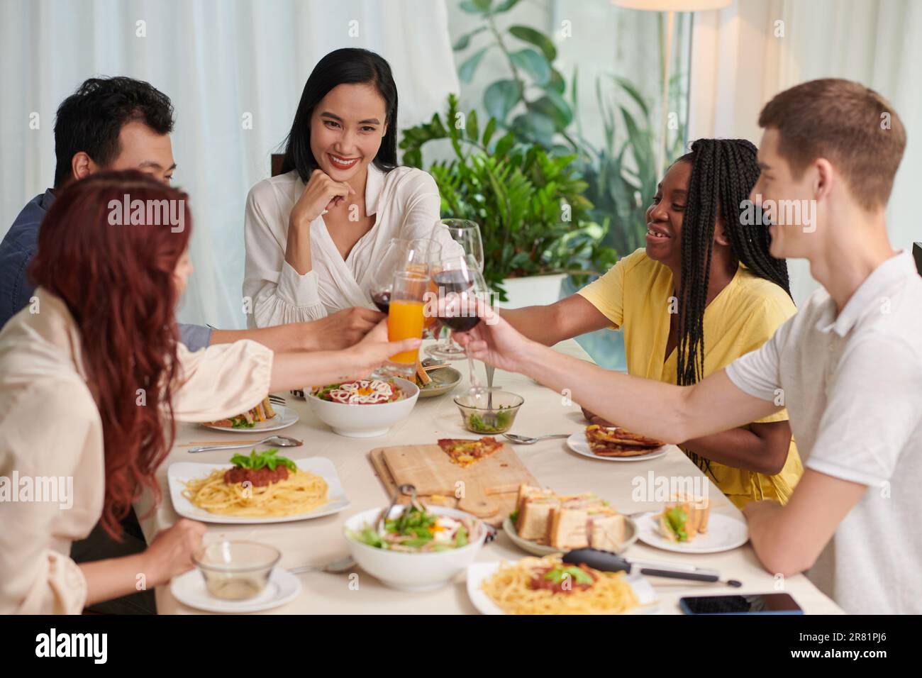Group happy intercultural friends hi-res stock photography and images ...