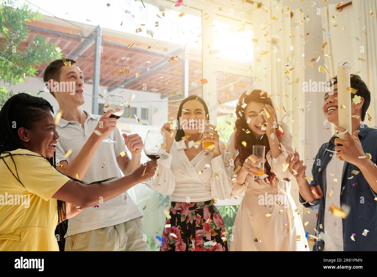 Friends dancing celebrating under hi-res stock photography and images ...