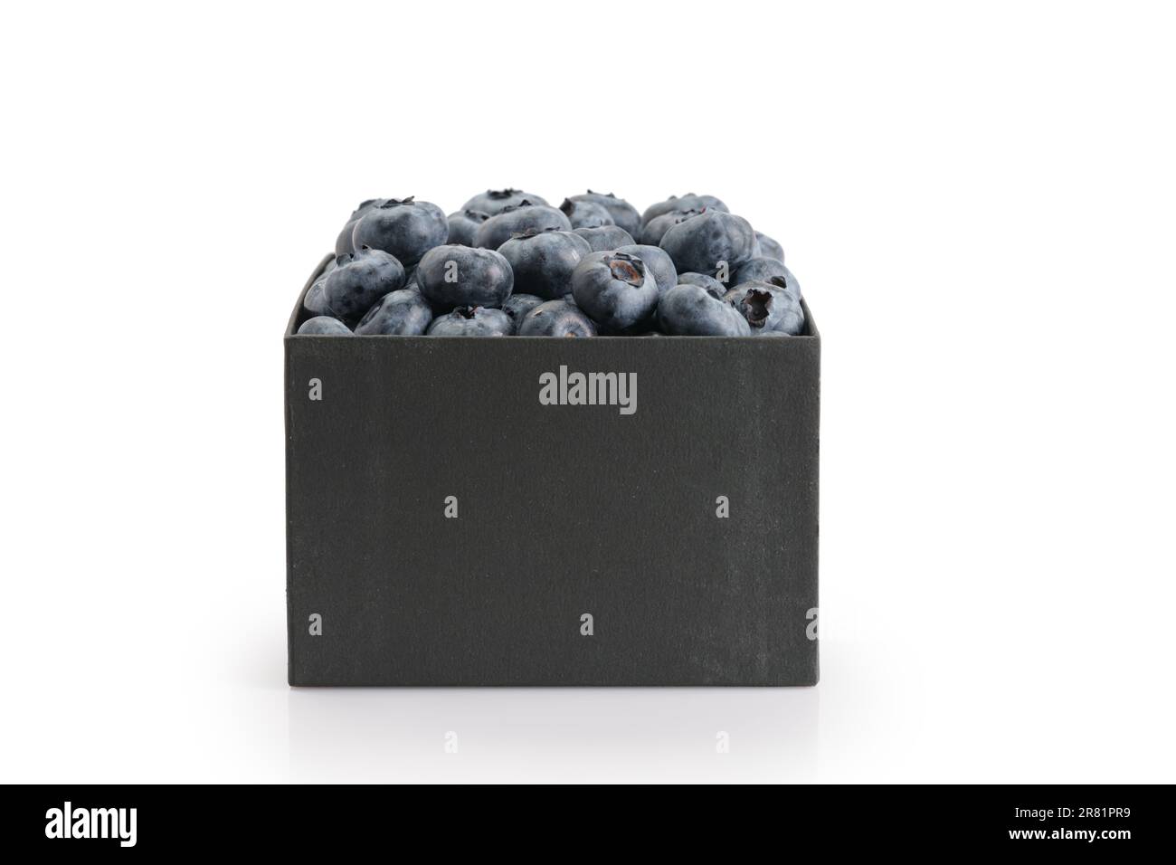 Fresh premium blueberries in black paper box isolated on white ...