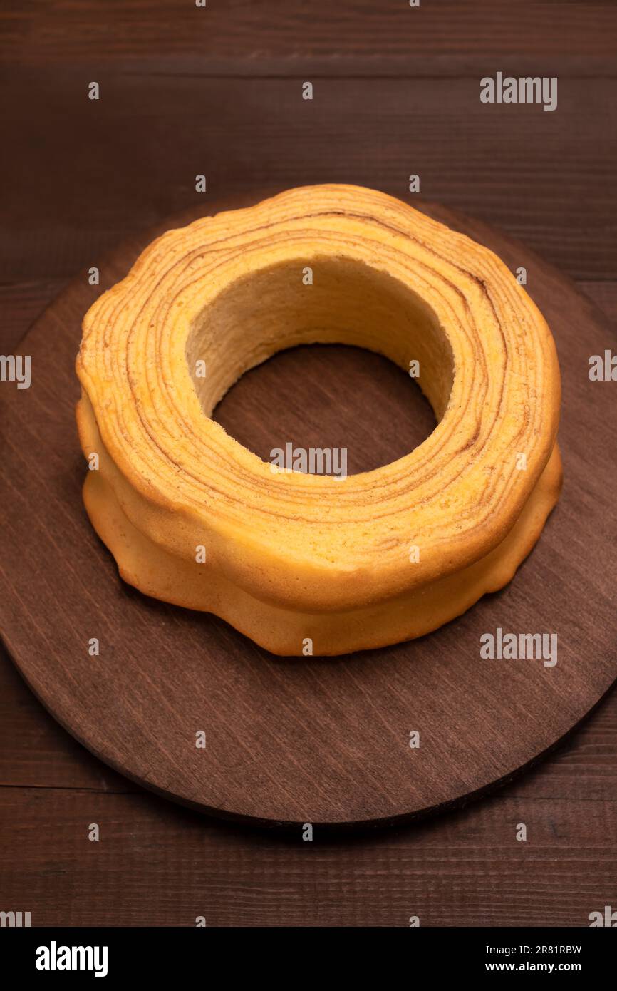 Top view of baumkuchen, sakotis ,sekacz on wooden table, traditional ...