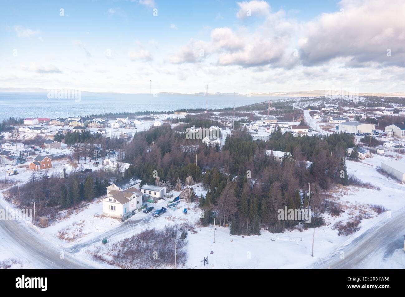 An aerial view of a winter port and harbor showcasing the waterfront ...