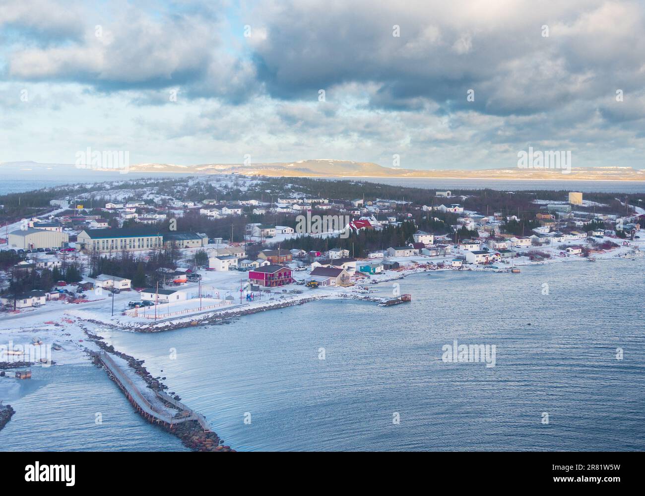 An aerial view of a winter port and harbor showcasing the waterfront ...