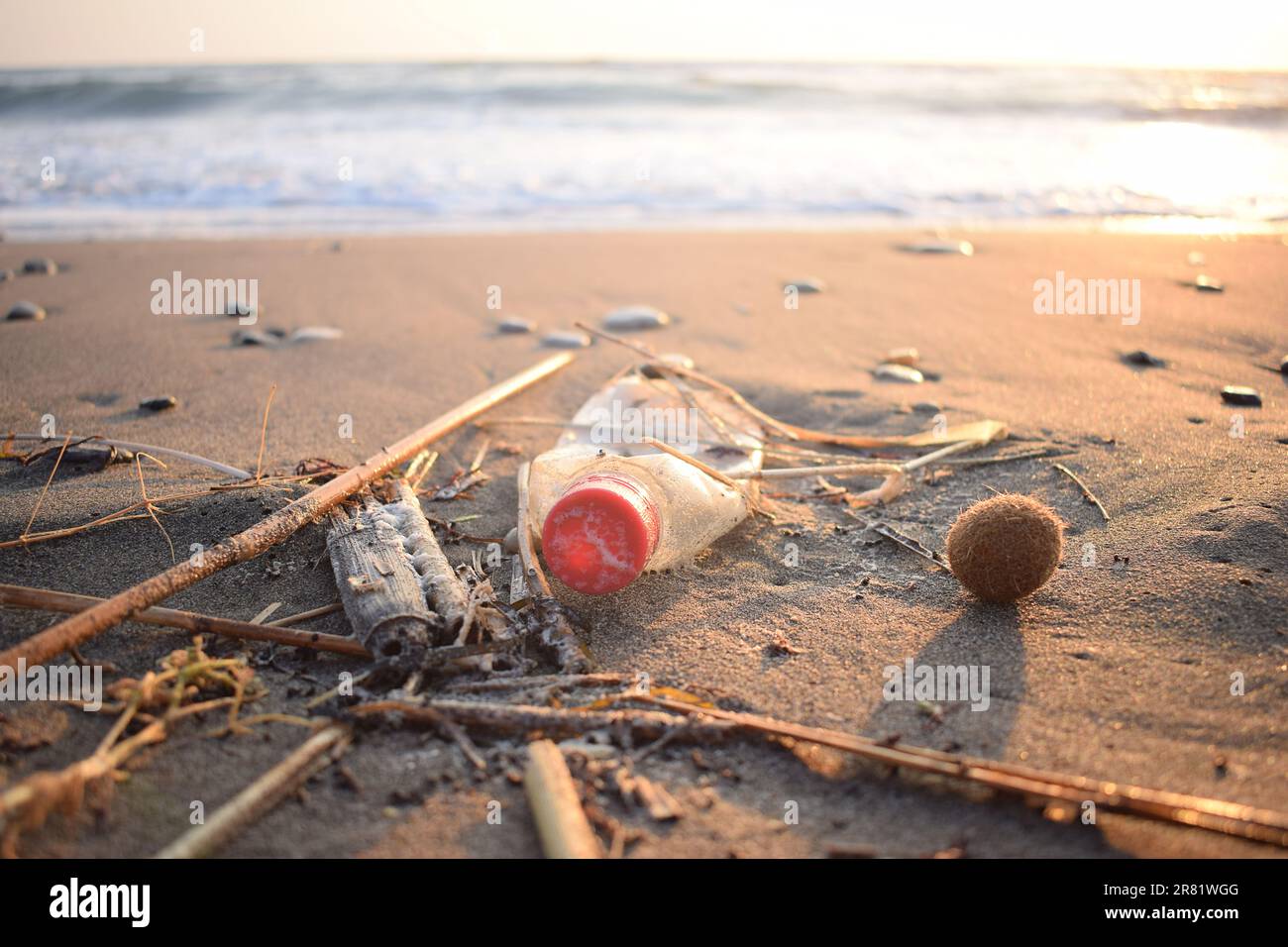 Plastic trash dumped on sand hi-res stock photography and images - Alamy