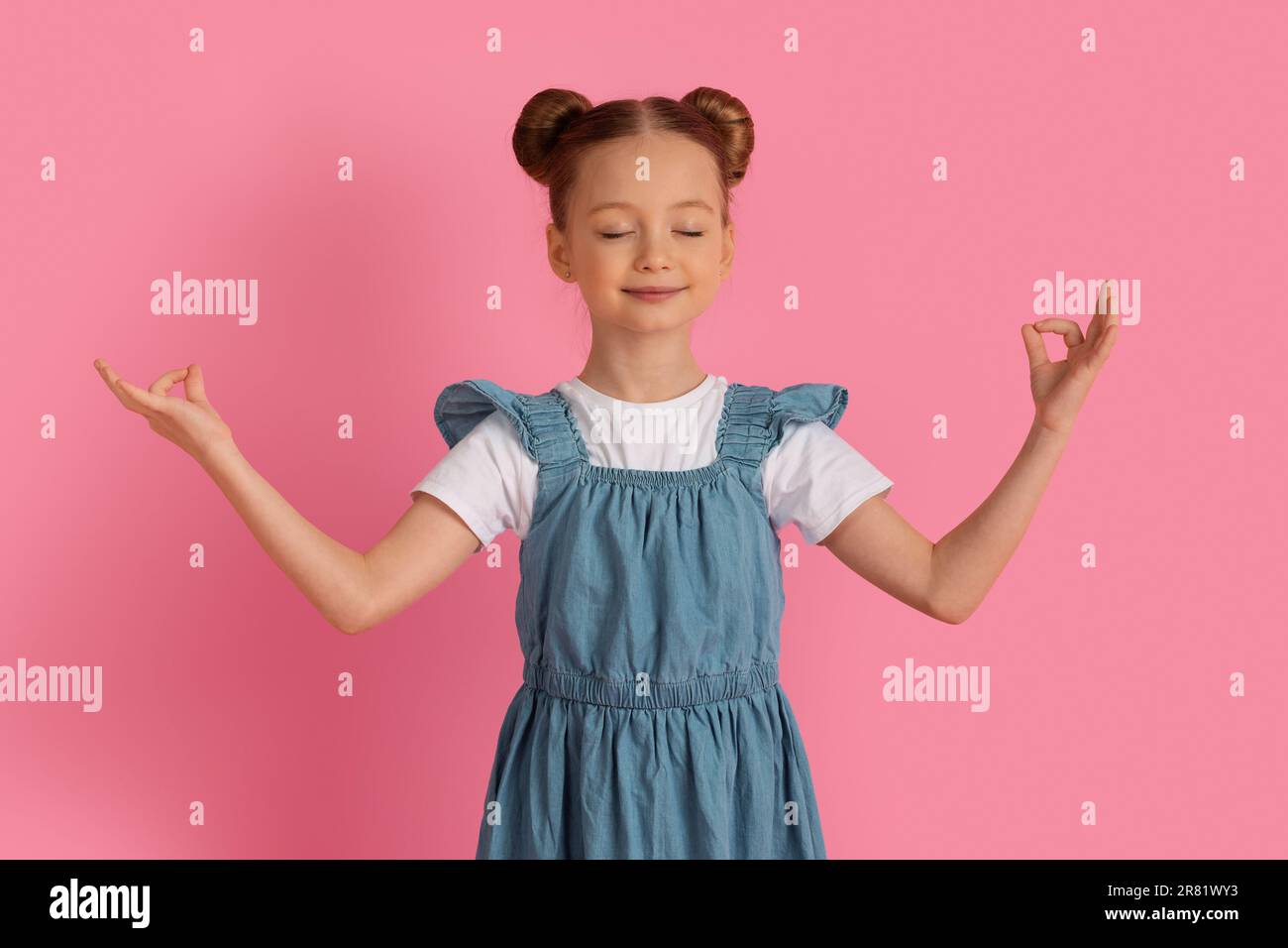 Zen. Cute Little Girl Meditating With Closed Eyes Over Pink Background ...