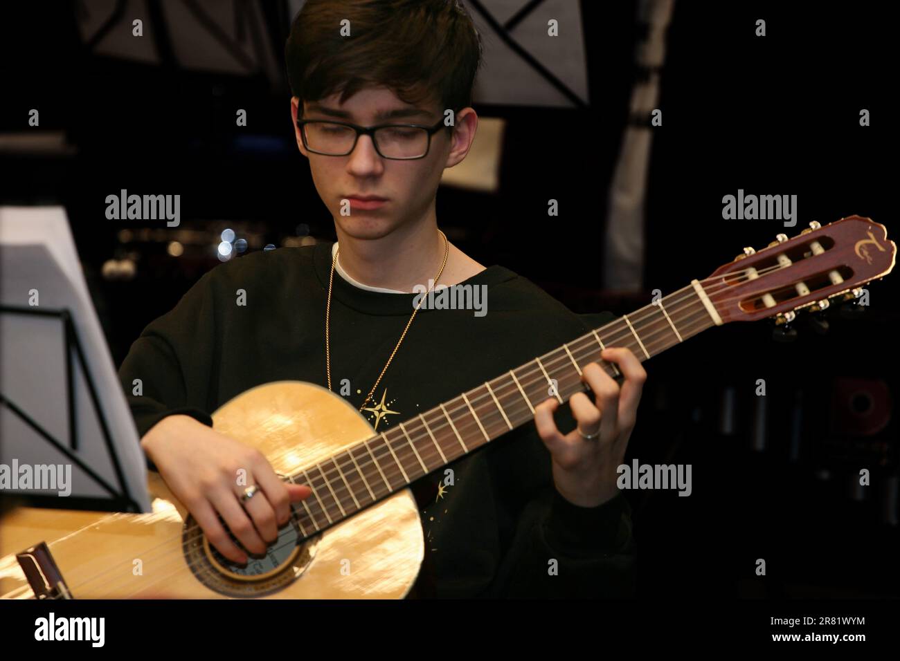 Young classical guitarist playing with the COMA (Contemporary Music for ...