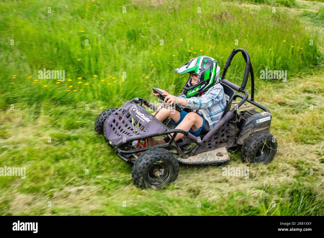 Electric powered Go-Kart racing around a field, High Bickington, North ...