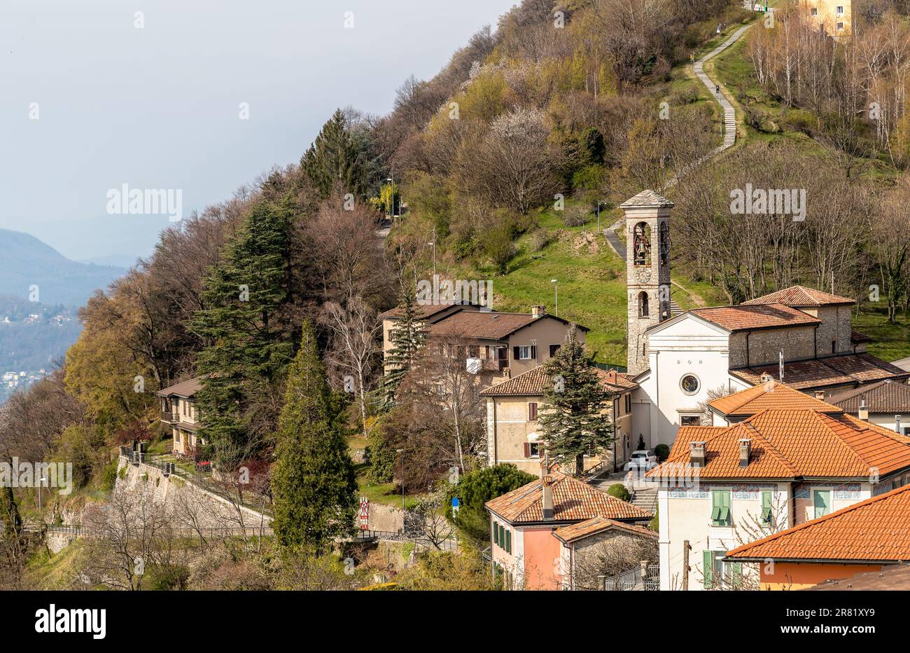 View of the Bre - Aldesago village with the Bell tower of the parish ...