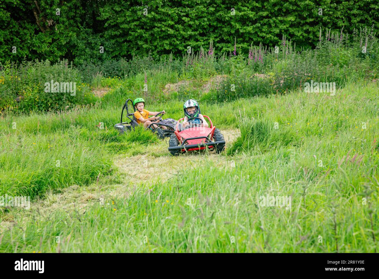 Electric powered Go-Kart racing around a field, High Bickington, North ...