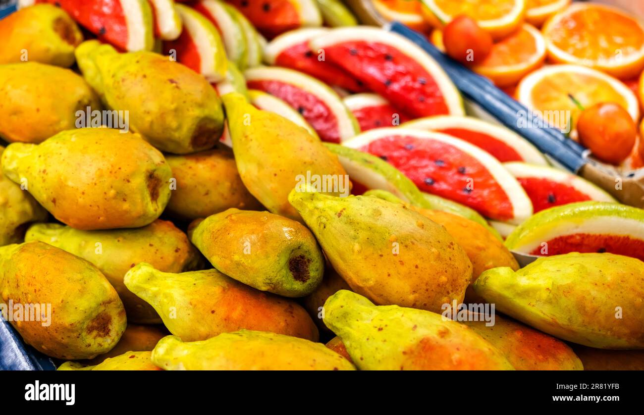 Marzipan fruits assortment. Close up of marzipan sweets shaped as ...