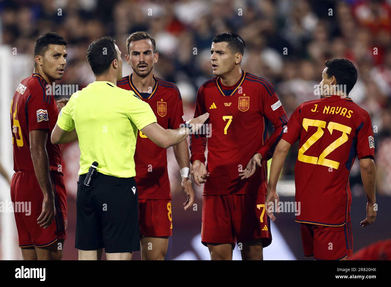 ROTTERDAM - (lr) Rodrigo Hernandez of Spain, referee Felix Zwayer ...