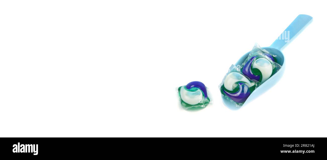 Washing detergent capsule pod isolated over the white background. Wide ...