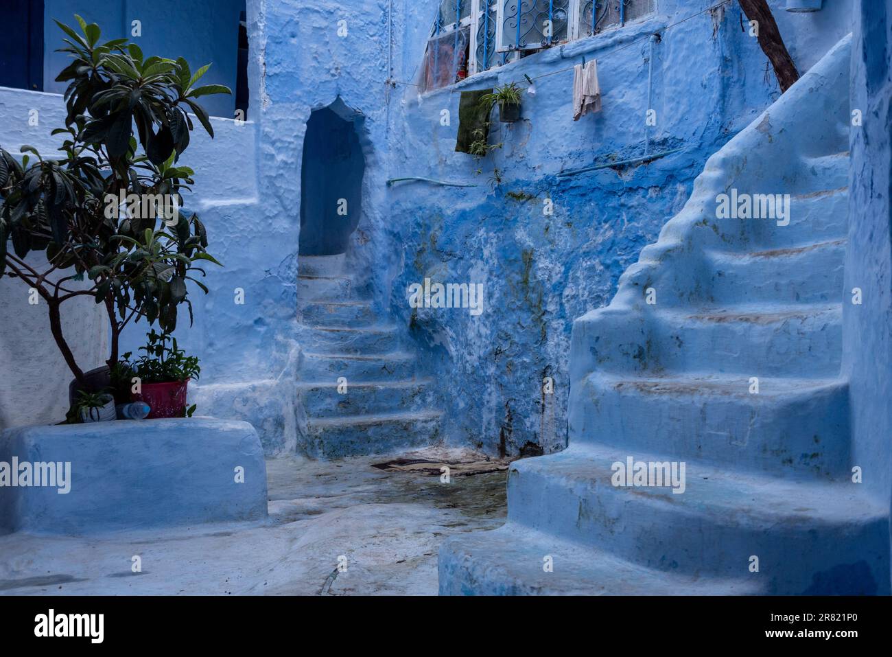 Vibrant blue colored staircases in downtown Chefchaouen, Morocco Stock ...