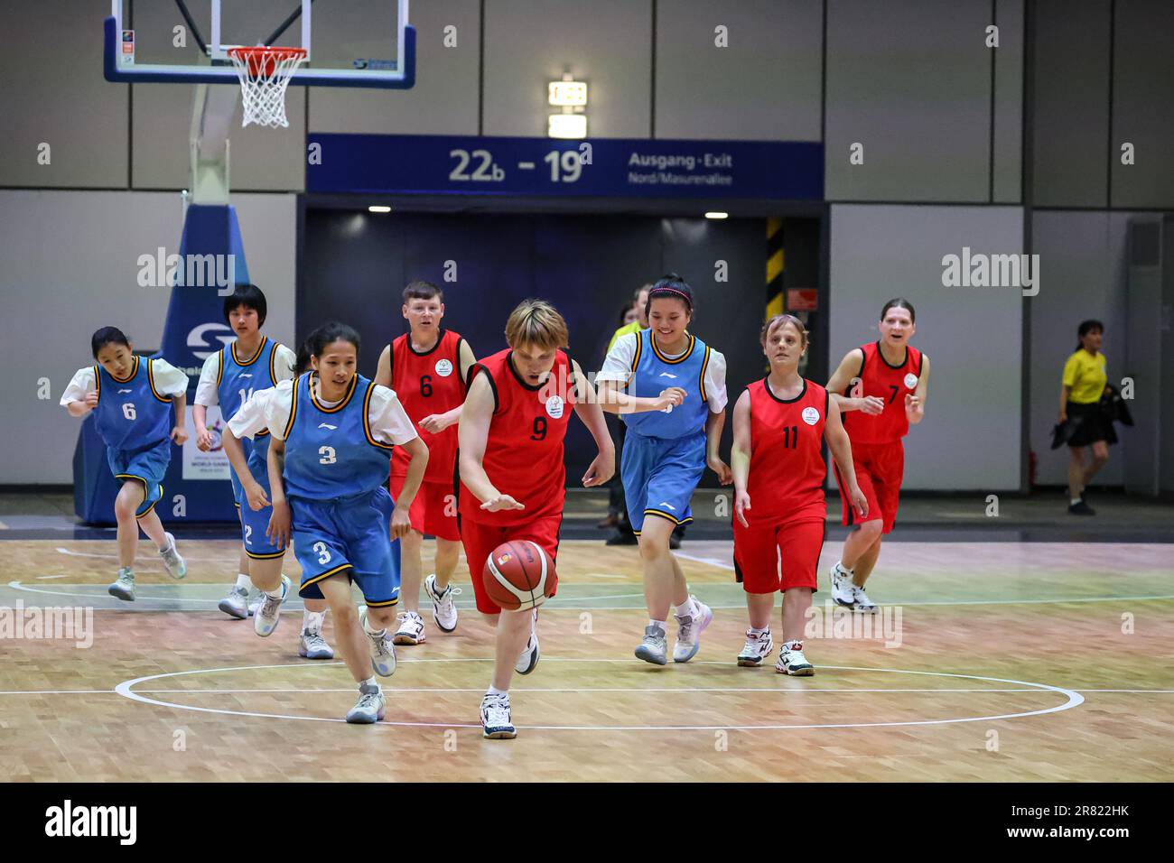 Athletes from China and Kazakhstan compete in basketball sport ...
