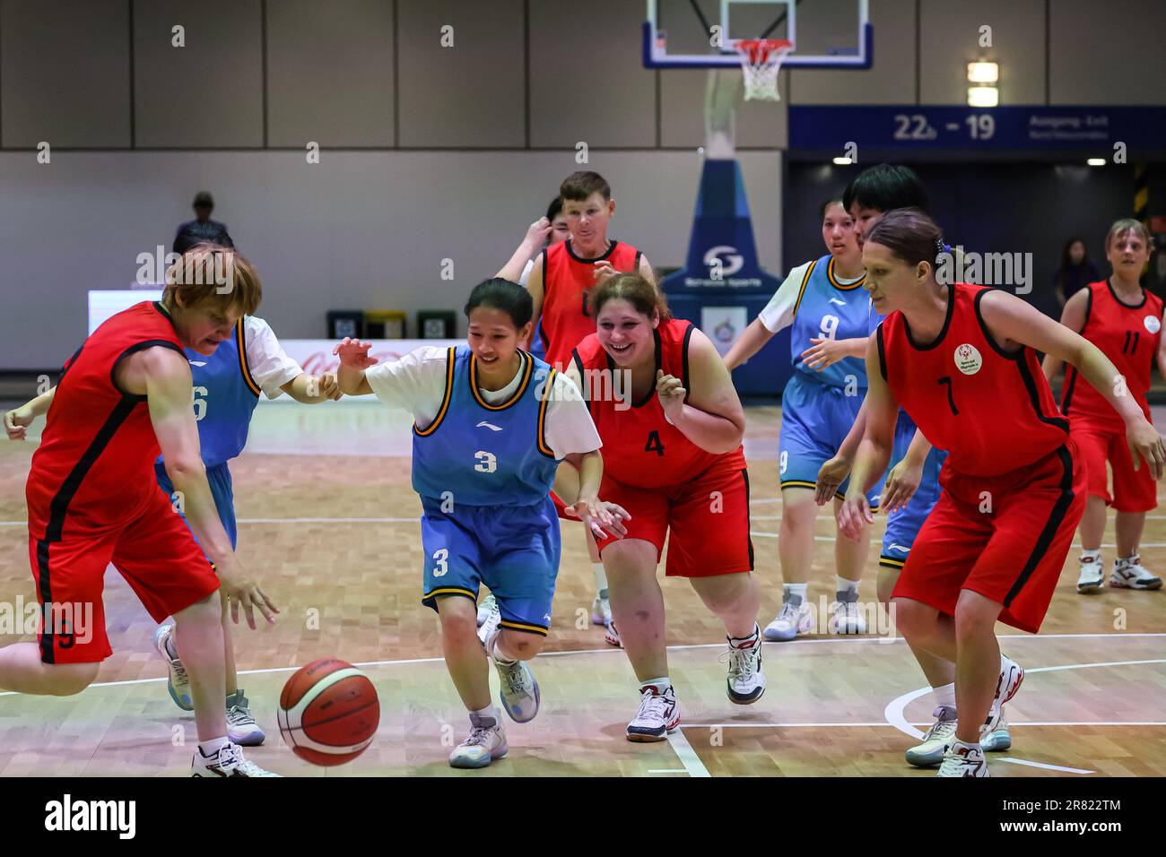 Athletes from China and Kazakhstan compete in basketball sport ...