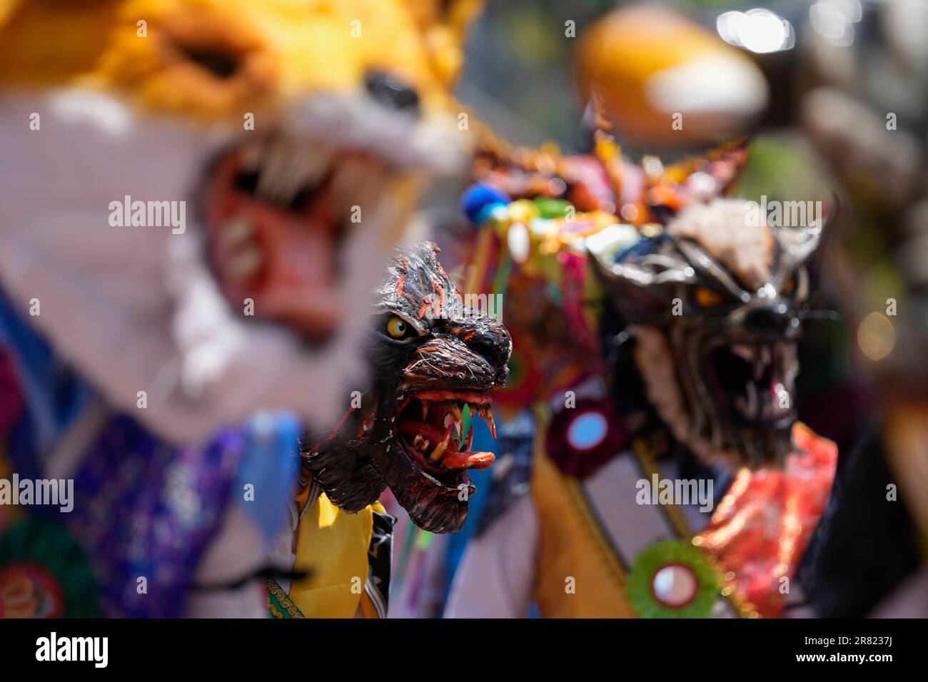 Dancers wearing devil masks perform during a Corpus Christi procession ...
