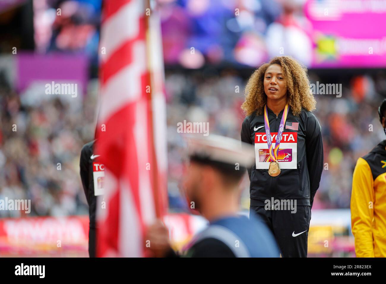 Kori Carter at the award ceremony and receiving the medal at the World ...