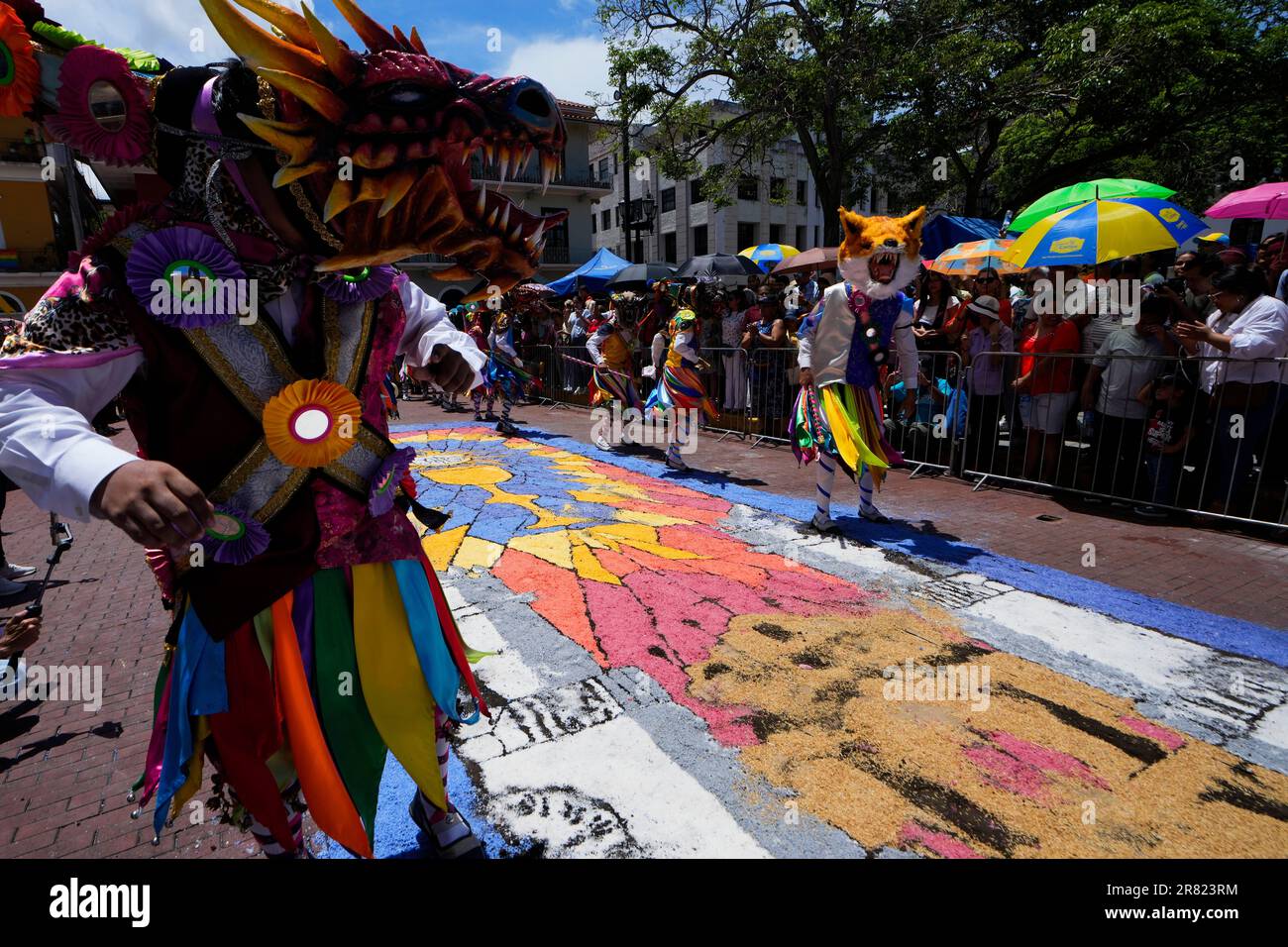 Dancers wearing devil masks perform during a Corpus Christi procession ...