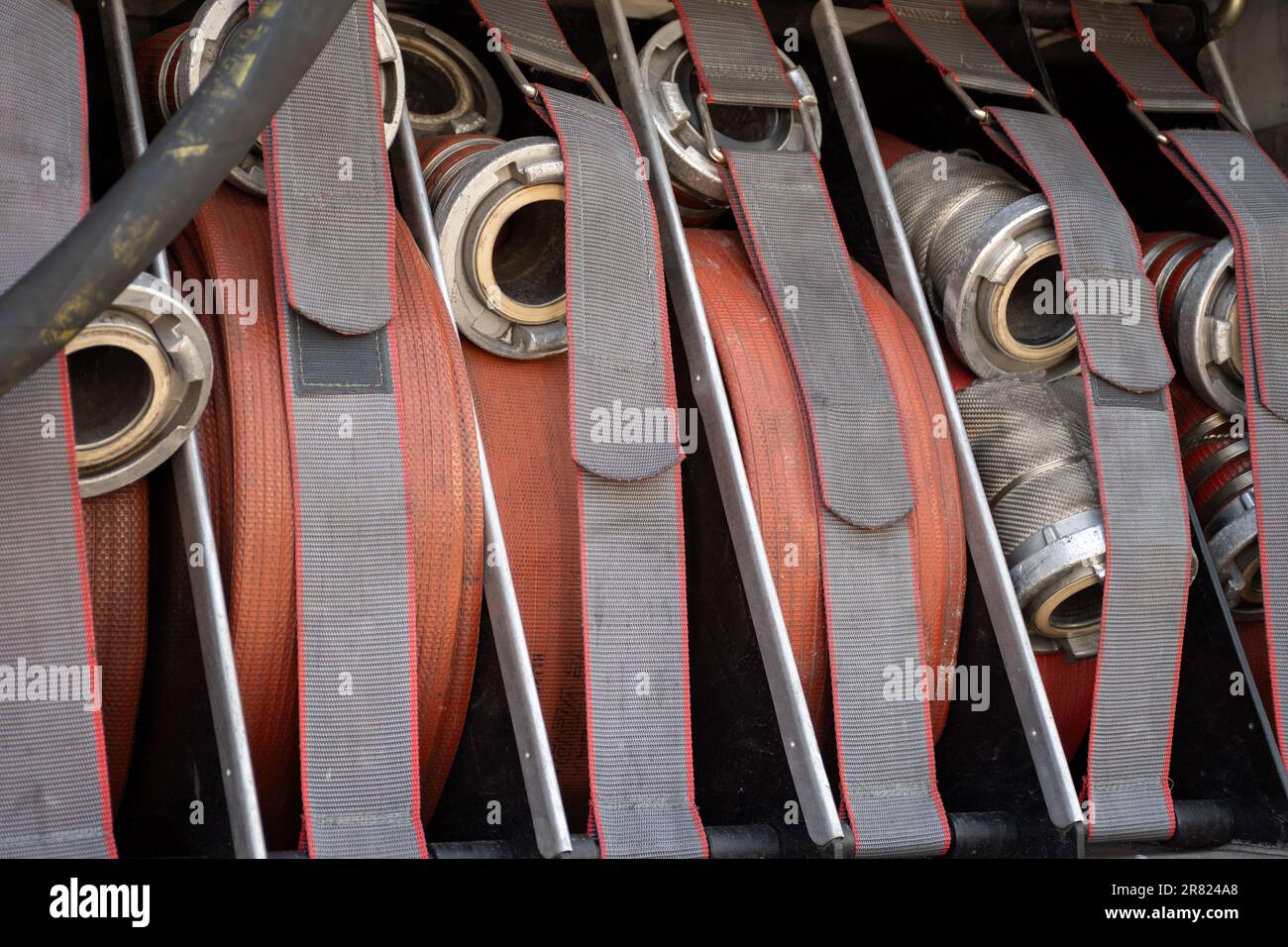 Fire engine equipment from the inside - fire hose hoses ready for use ...