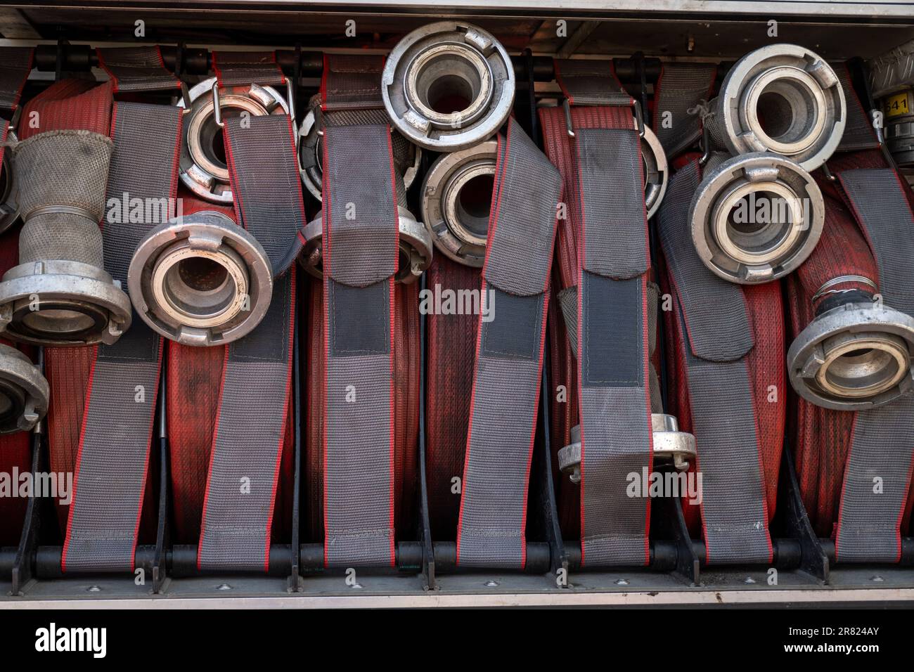 Fire engine equipment from the inside - fire hose hoses ready for use ...