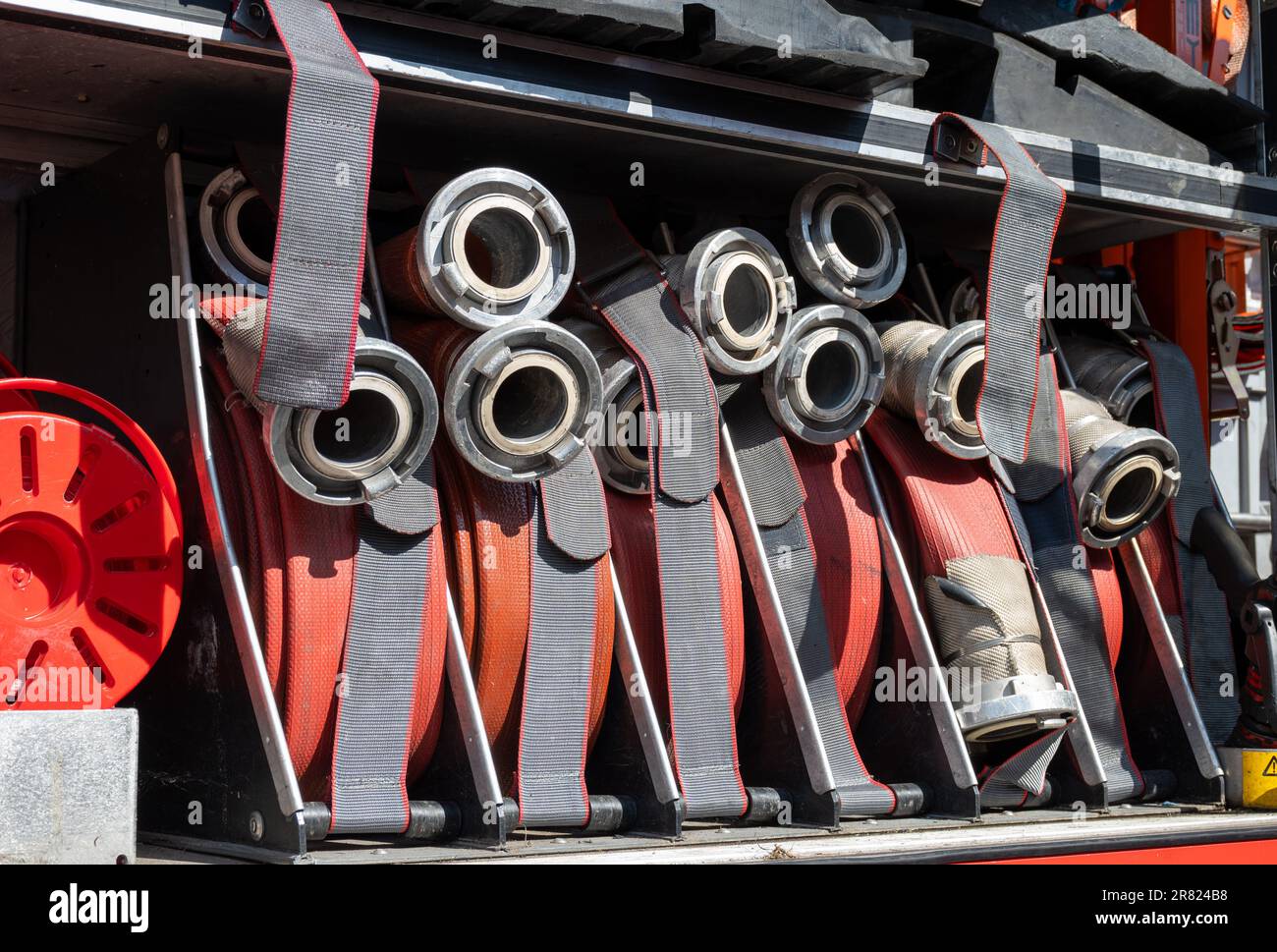 Fire engine equipment from the inside - fire hose hoses ready for use ...