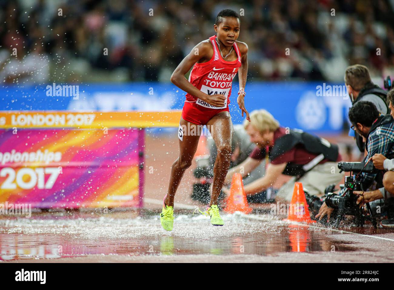 Winfred Mutile Yavi participating in the 3000 Meters Steeplechase at ...