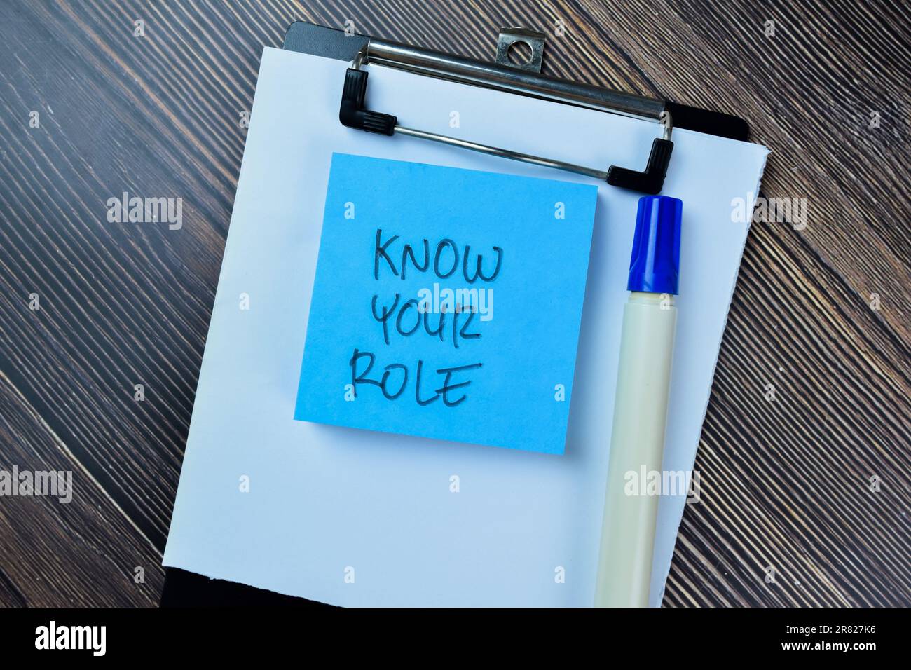 Concept of Know Your Role write on sticky notes isolated on Wooden ...