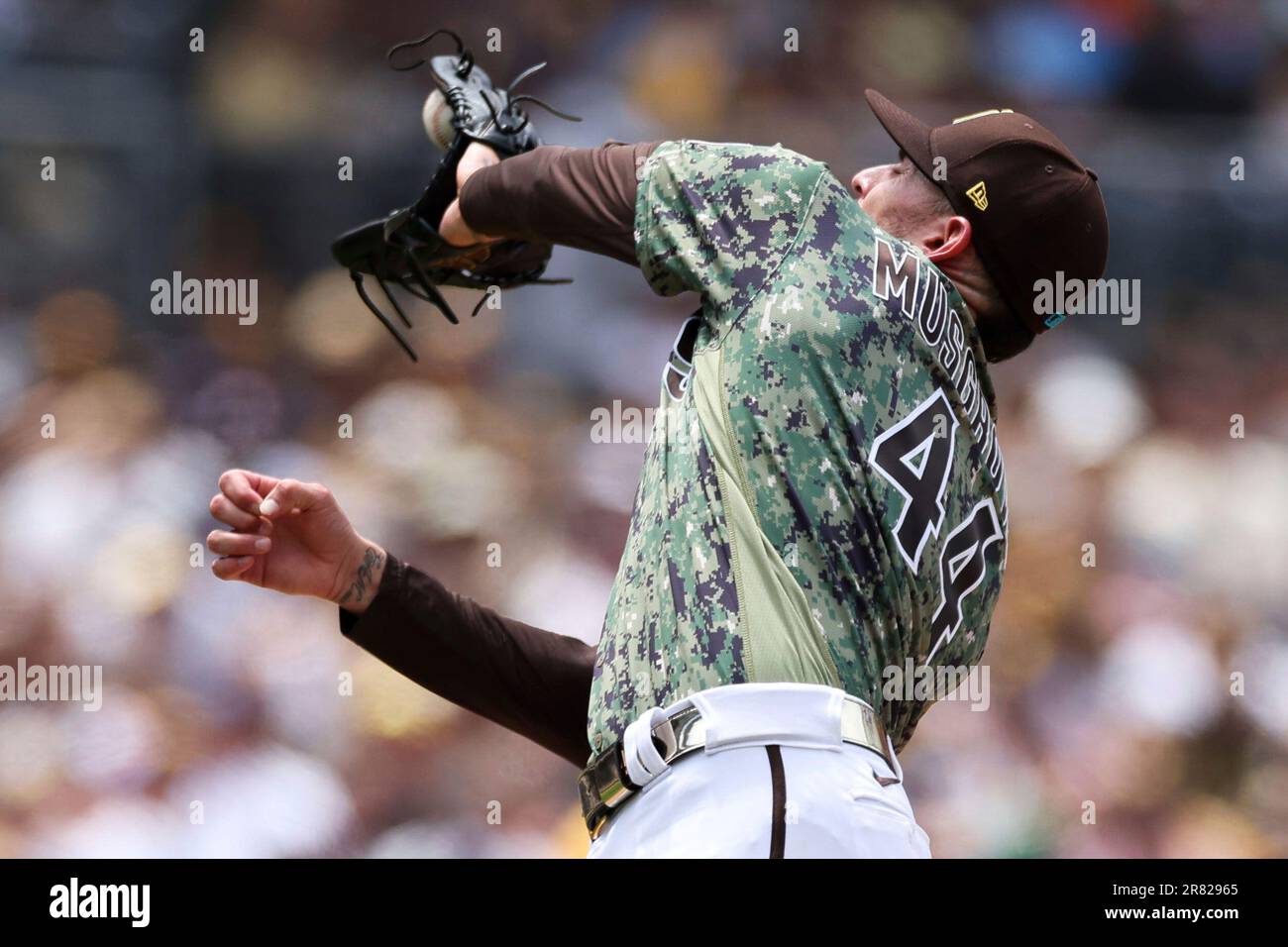San Diego Padres' Joe Musgrove attempts to field a ball hit by Tampa ...