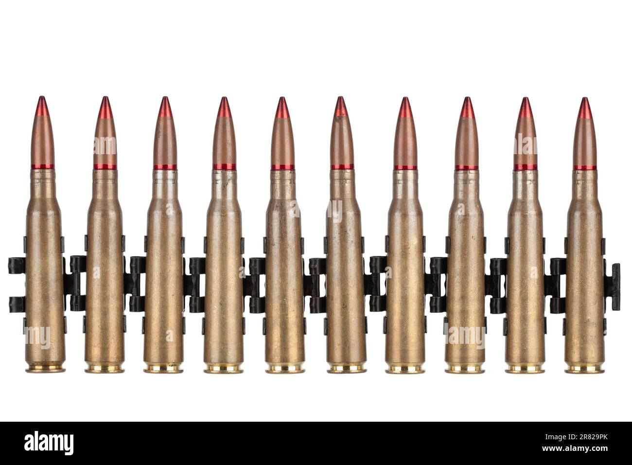 Ammunition belt with cartridges for heavy machine gun isolated on white ...