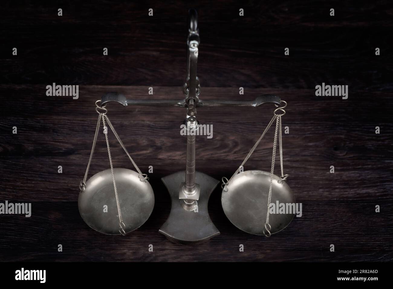 Bronze traditional balance scale on wooden table background Stock Photo ...