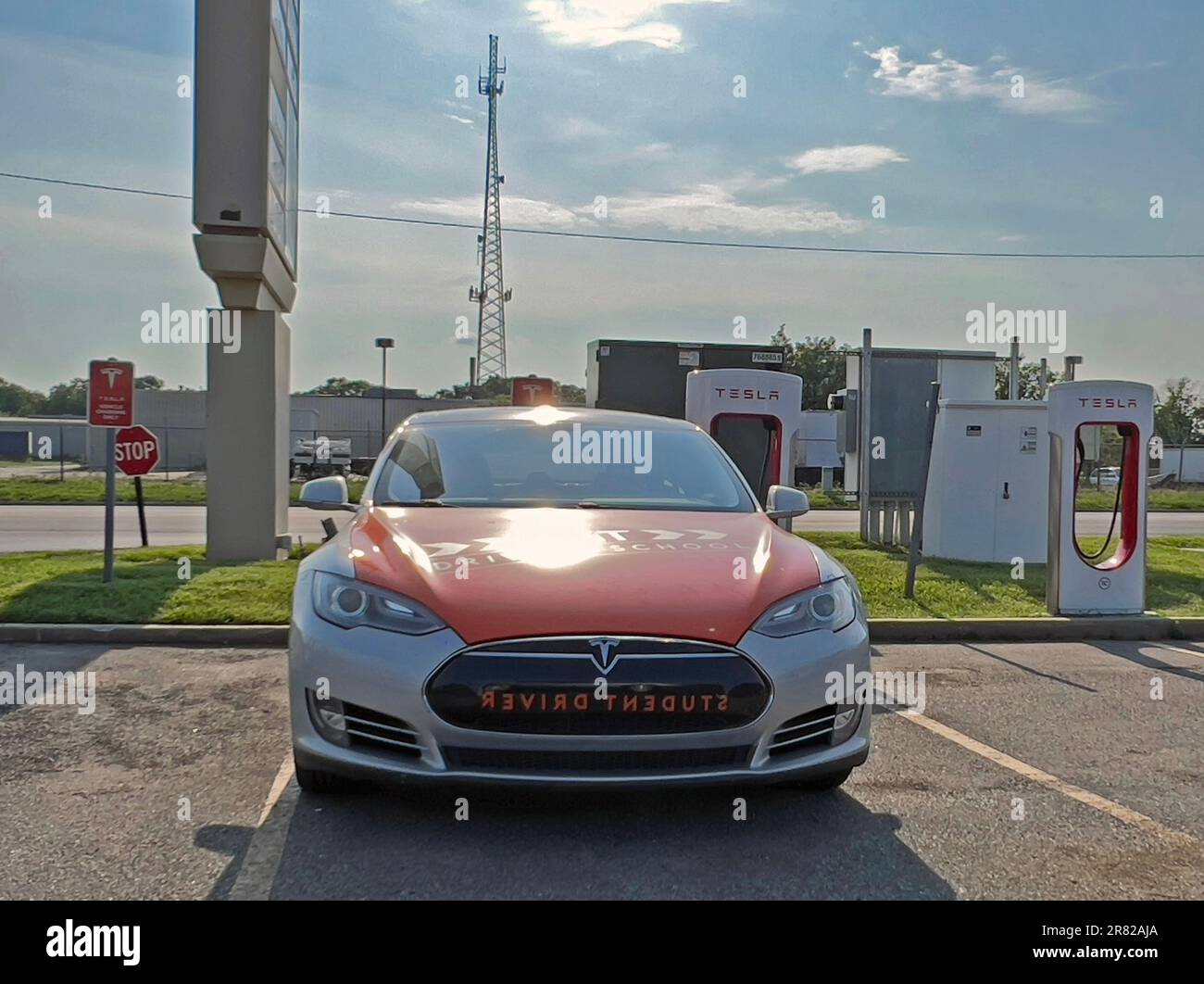 EMPORIA, KANSAS - JUNE 6, 2023 A Tesla model 3 that has been wrapped ...