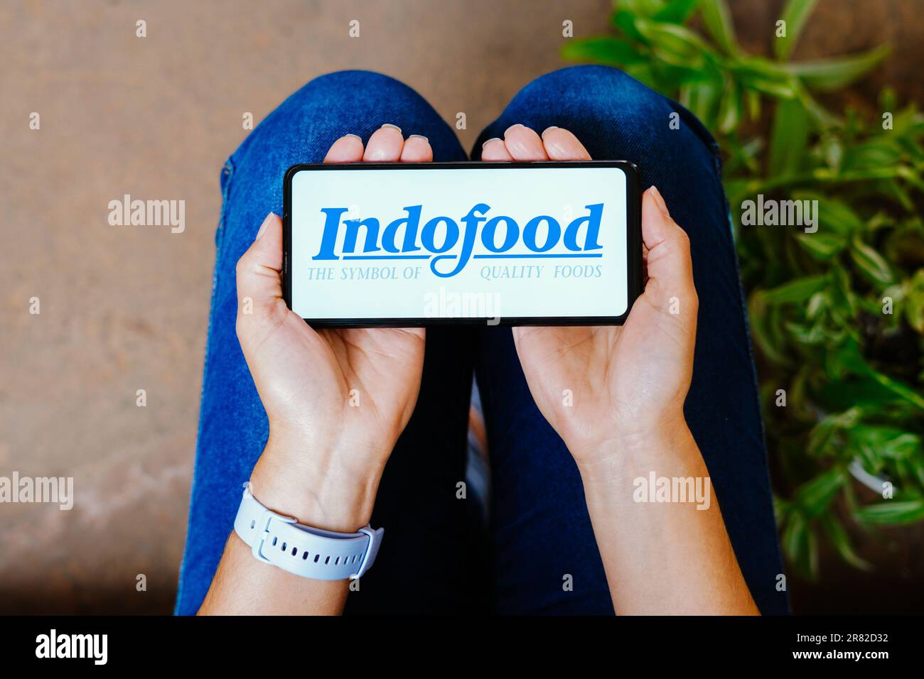 In This Photo Illustration The Pt Indofood Sukses Makmur Tbk Logo Is Displayed On A Smartphone