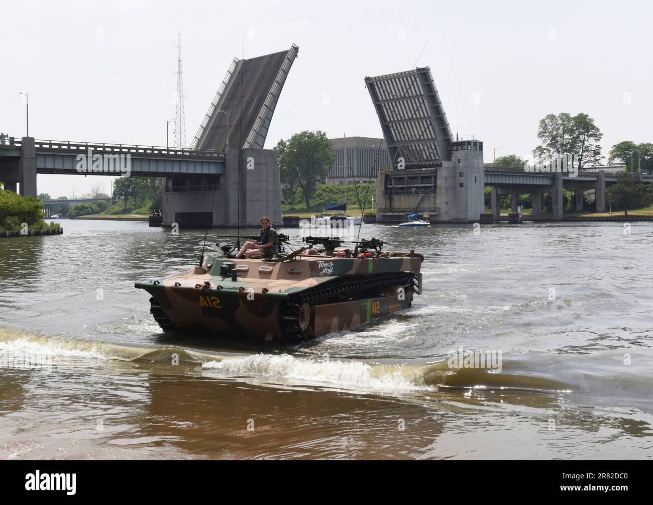 A 1945 LVT 4 Water Buffalo Amphibian Tractor exits the St. Joseph River ...