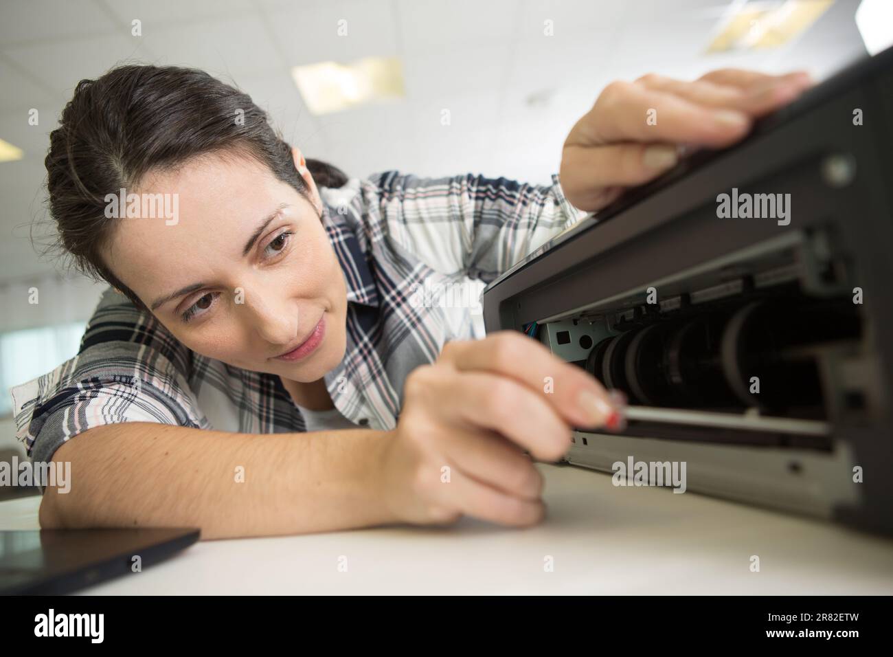Woman printer cartridge hi-res stock photography and images - Alamy
