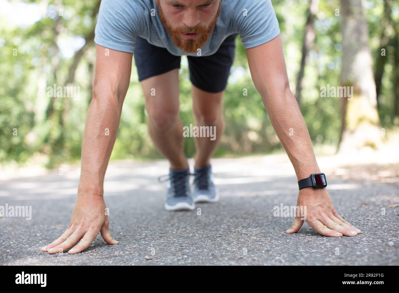fitness man training and jogging in fall park Stock Photo - Alamy