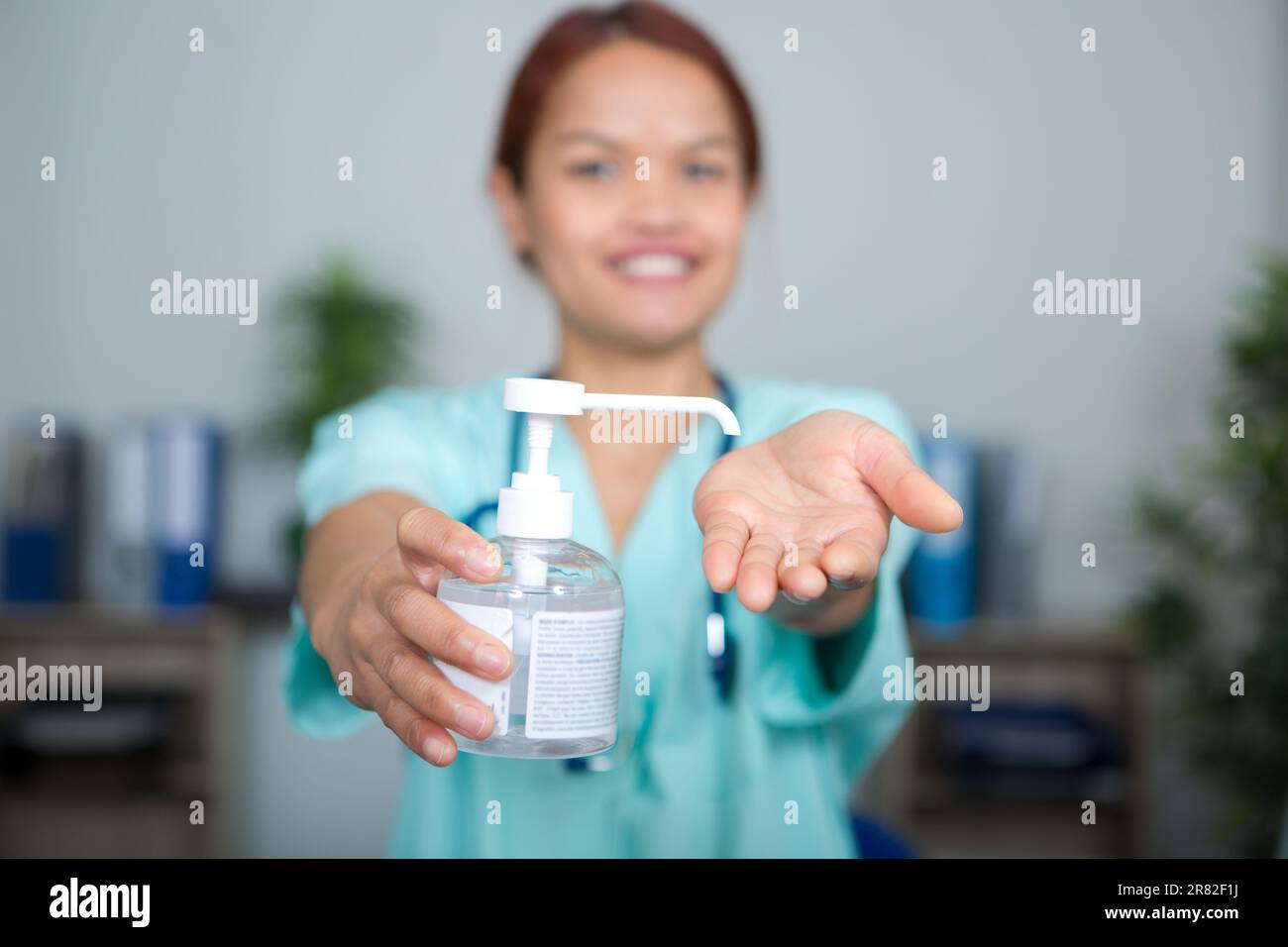 Female nurse isolated white scrubs pretty young caucasian hi-res stock ...