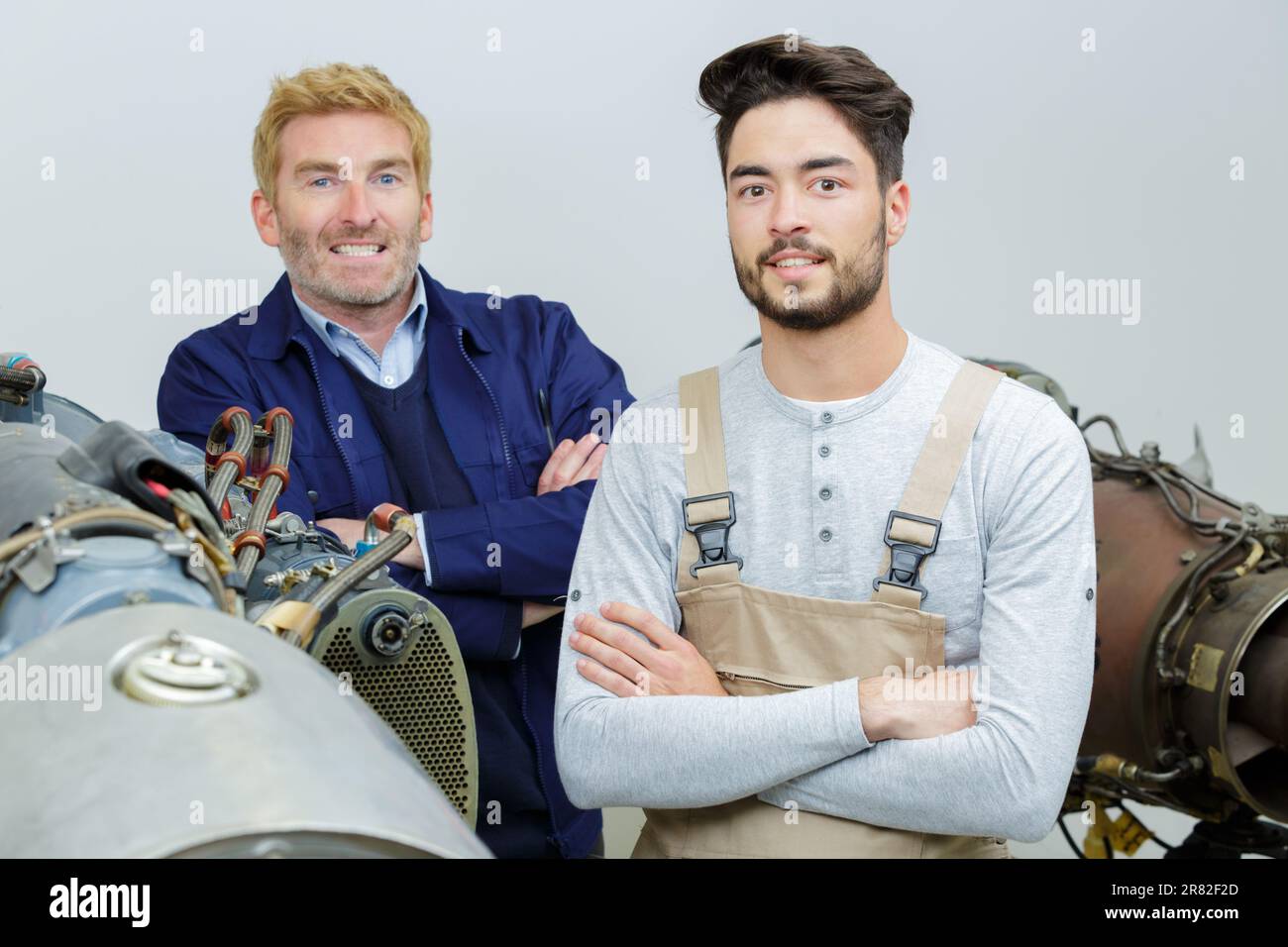 portrait of aircraft mechanics posing Stock Photo - Alamy