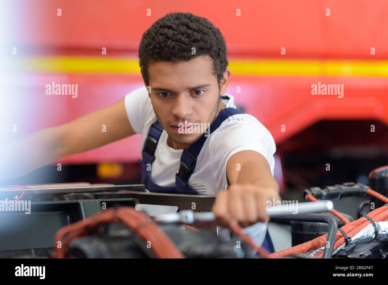 Male working car engine transportation automotive repairs hi-res stock ...