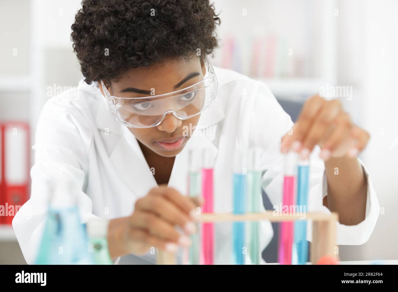 female lab worker doing tests in a laboratory Stock Photo - Alamy