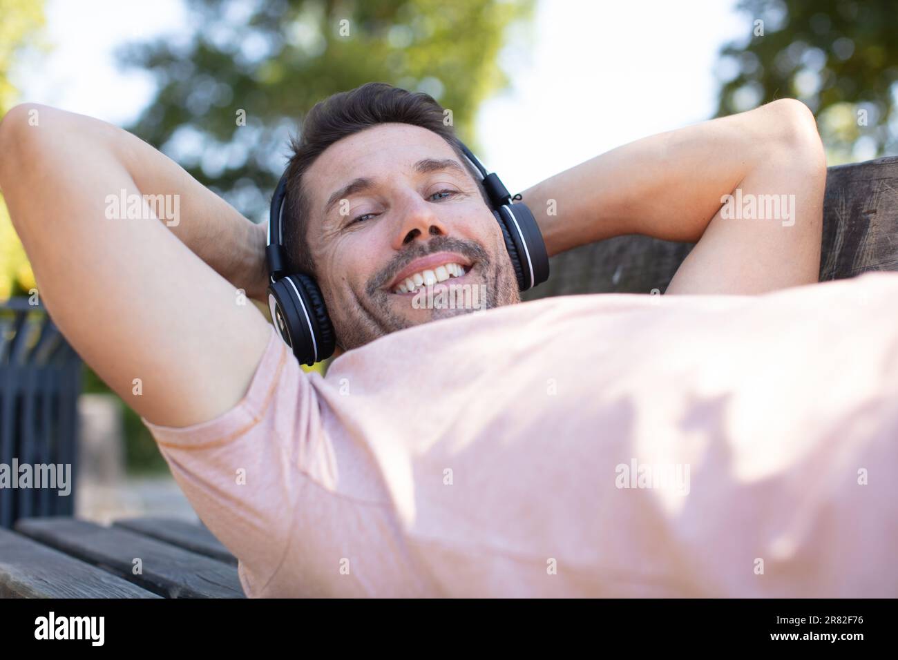 Young man lying on work bench hi-res stock photography and images - Alamy
